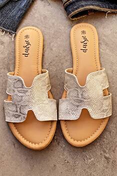 Buy Daisie White Faux Leather Animal Print Sliders Online | Aza Fashions