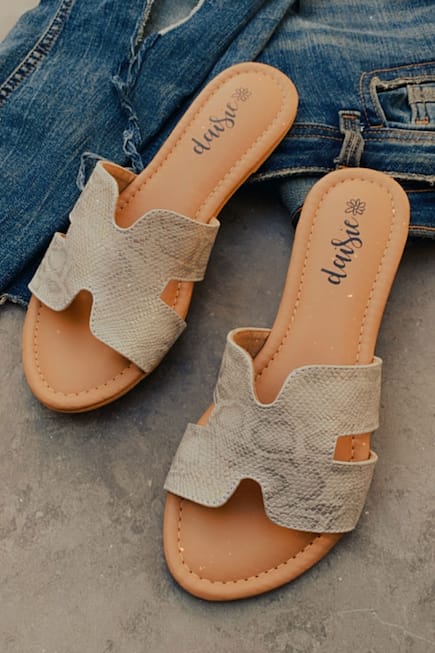 Buy Daisie White Faux Leather Animal Print Sliders Online | Aza Fashions