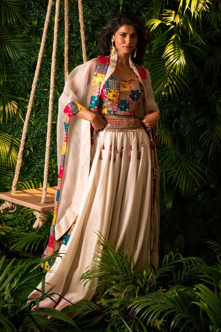 Buy Ivory Multi-patch Cape And Lehenga Set For Women by Pallavi Poddar ...