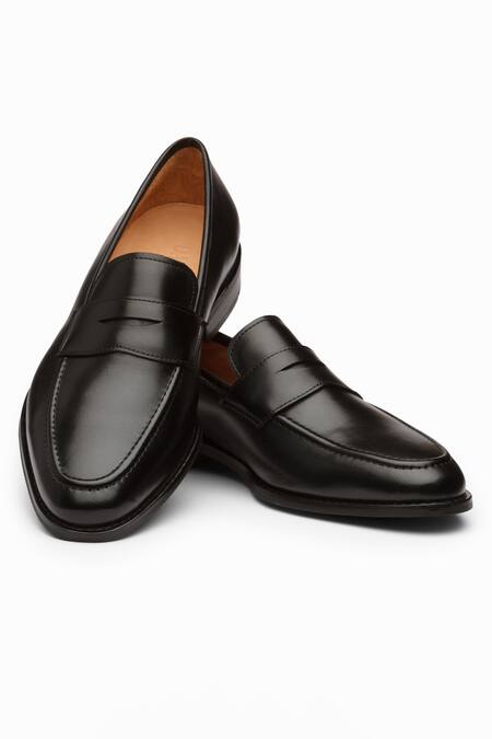 Buy Black Handcrafted Penny Loafers For Men by dapper Shoes Online at Aza Fashions.
