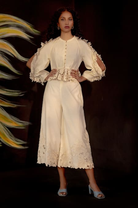 Buy Ivory Chanderi Cutwork Floral Motifs Round Ruffle Top For Women by ...