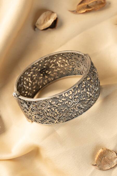 Buy Silver Plated Swirl Pattern Cutwork Bangle by Mero Jewellery Online ...