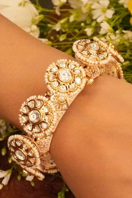 Buy Gold Plated Stone Aural Studded Pearl Bangles Set of 2 by Ekathva Jaipur Online at Aza Fashions
