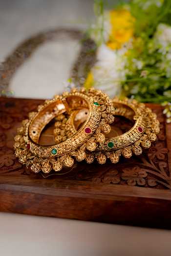 Buy Gold Plated Stone Jivanta Carved Temple Pacheli Bangles-Set of 2 by ...