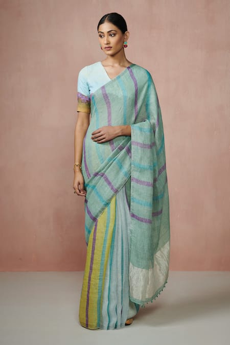 Buy Blue Linen Teal Striped Saree With Blouse Piece For Women by Dressfolk Online at Aza Fashions.