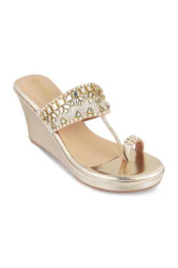 Buy Gold Stone Anaya Embellished Kolhapuri Wedges by Crimzon Online at ...