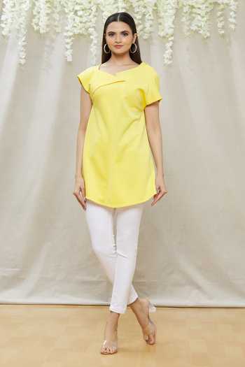 Buy Megha Garg Yellow Scuba Asymmetric Draped Top Online | Aza Fashions