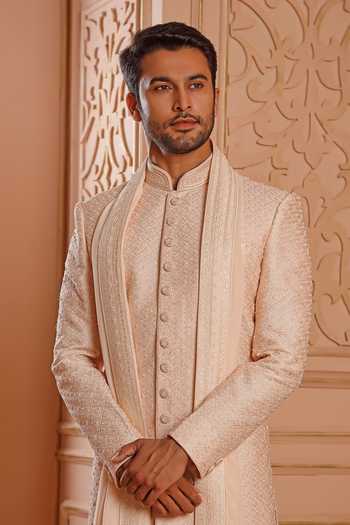 Buy Vanshik Peach Raw Silk Floral Embroidered Sherwani Set Online | Aza ...