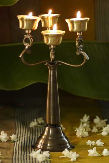 Buy COURTYARD Madurai T Light Stand Online | Aza Fashions