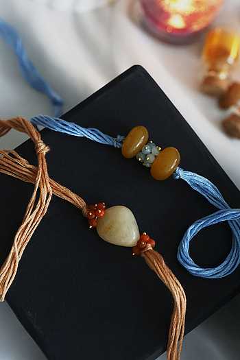 Buy Phiroza Augustino Stone Rakhi (Set of 2) Online | Aza Fashions
