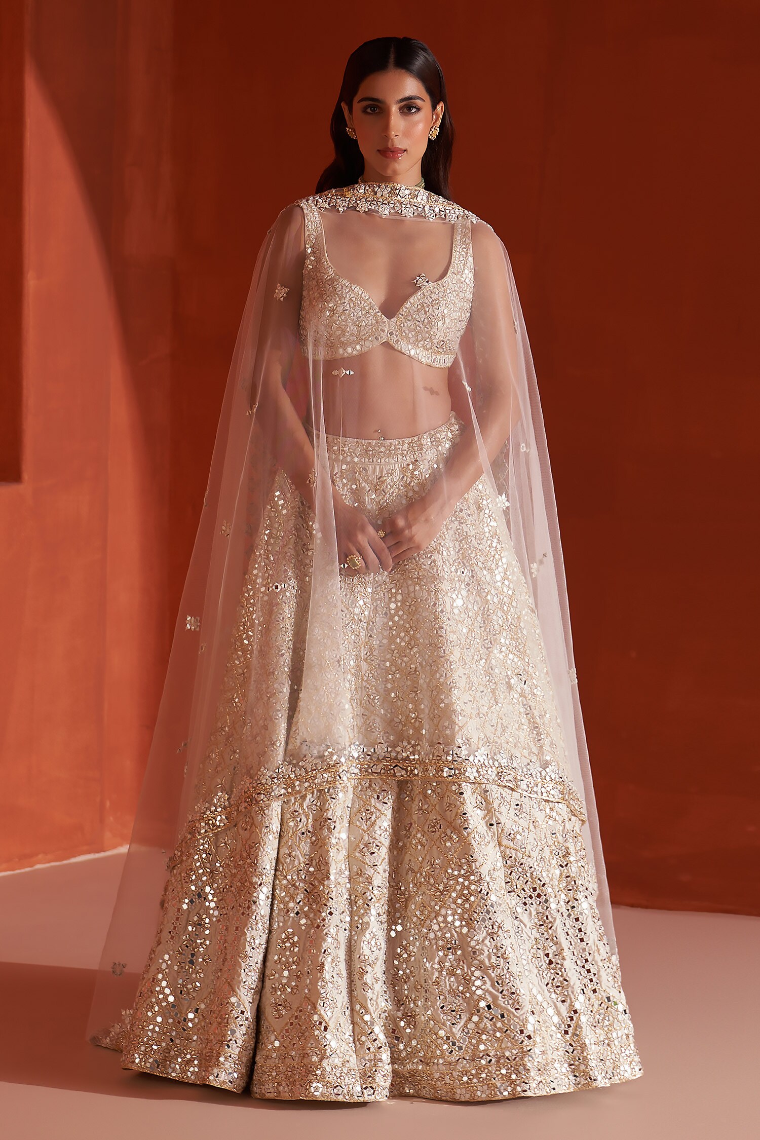 Buy Mirror & Gota Embroidered Lehenga Set by Angad Singh at Aza Fashions