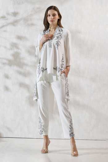 Buy White Crepe Embroidery Thread Panel Straight Pant For Women by ...