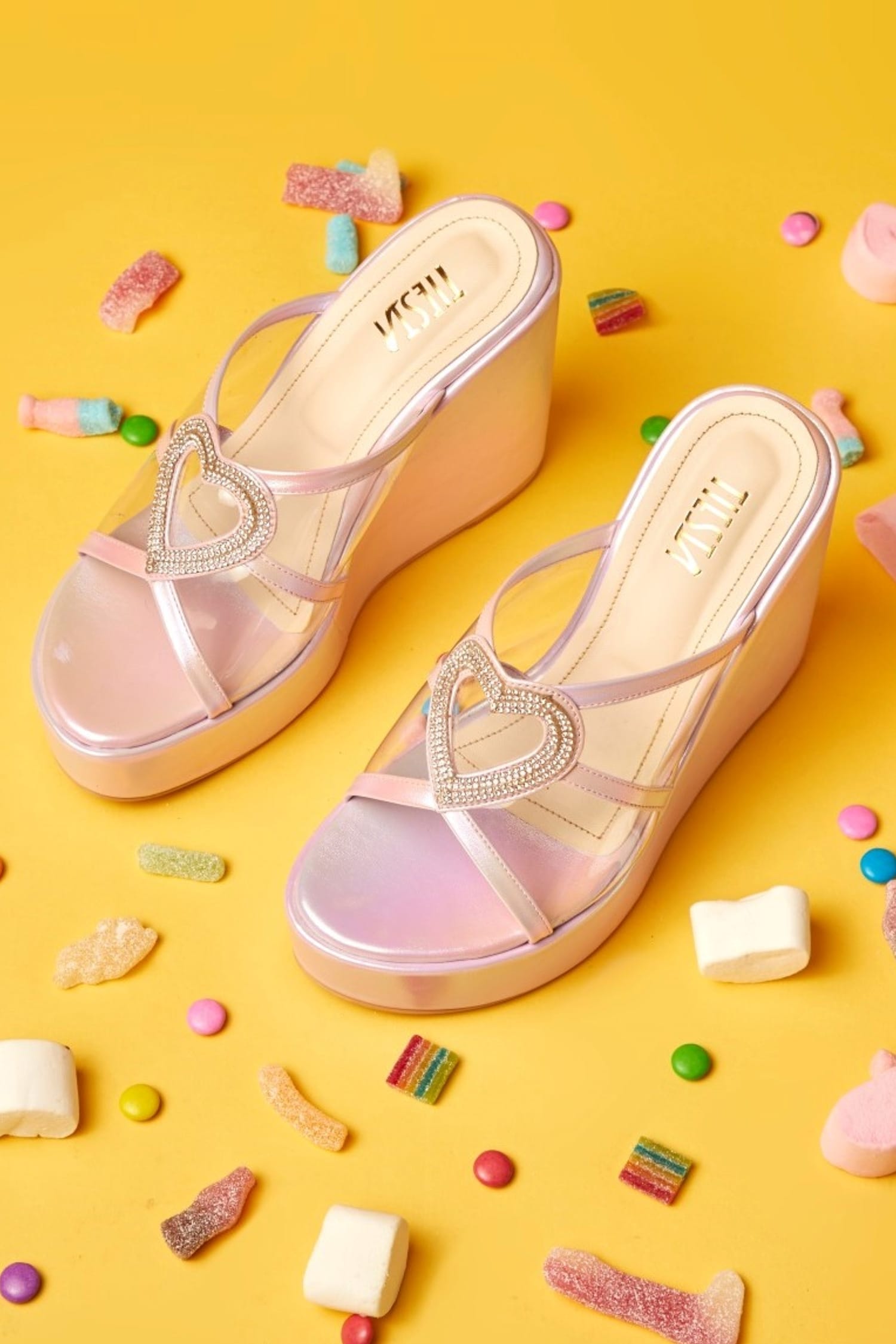 Buy Pink Jellybean Heart Cut-out Wedges by Tiesta Online at Aza Fashions.