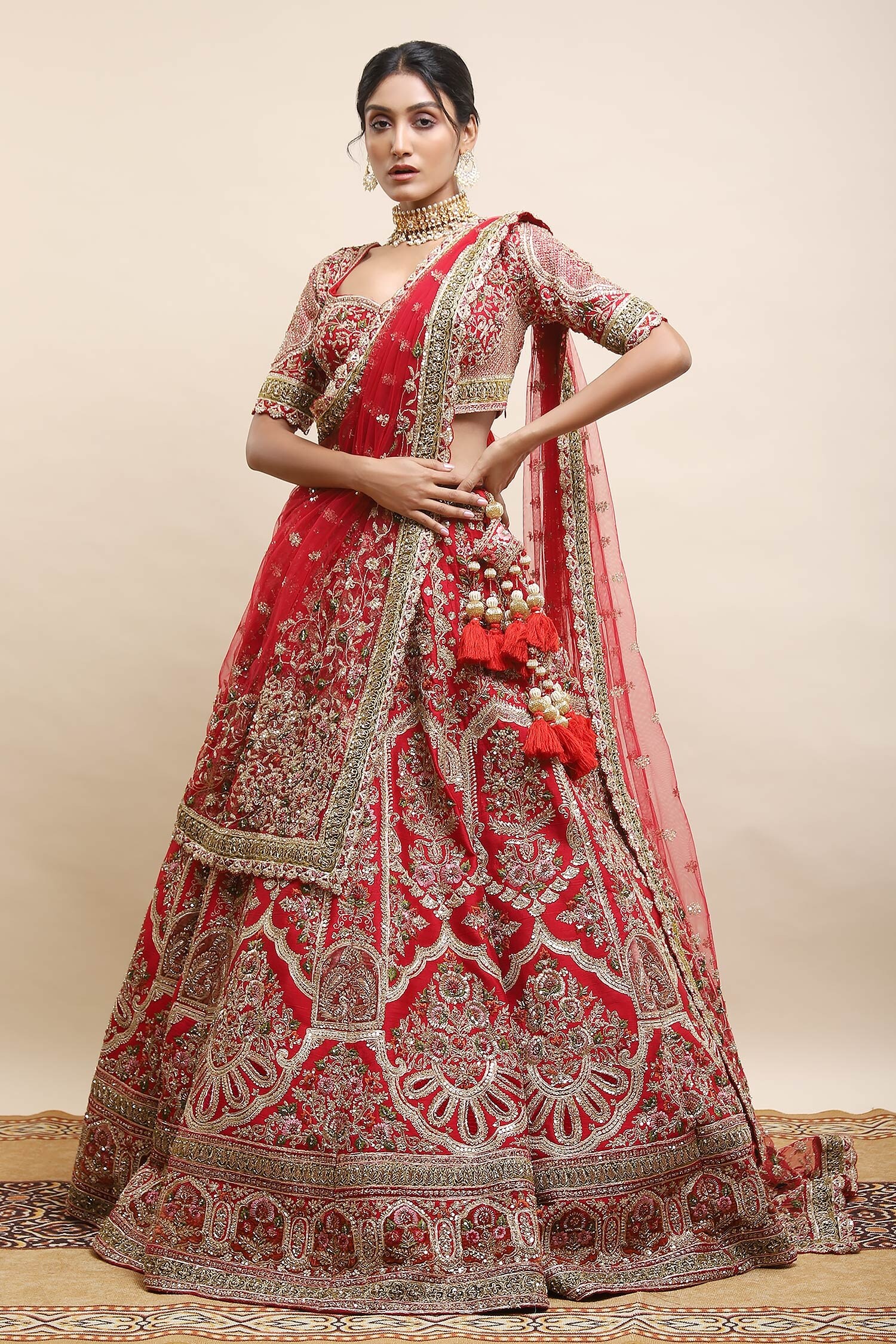 Buy Red Raw Silk Embellished Cutdana Sweetheart Floret Bridal Lehenga ...