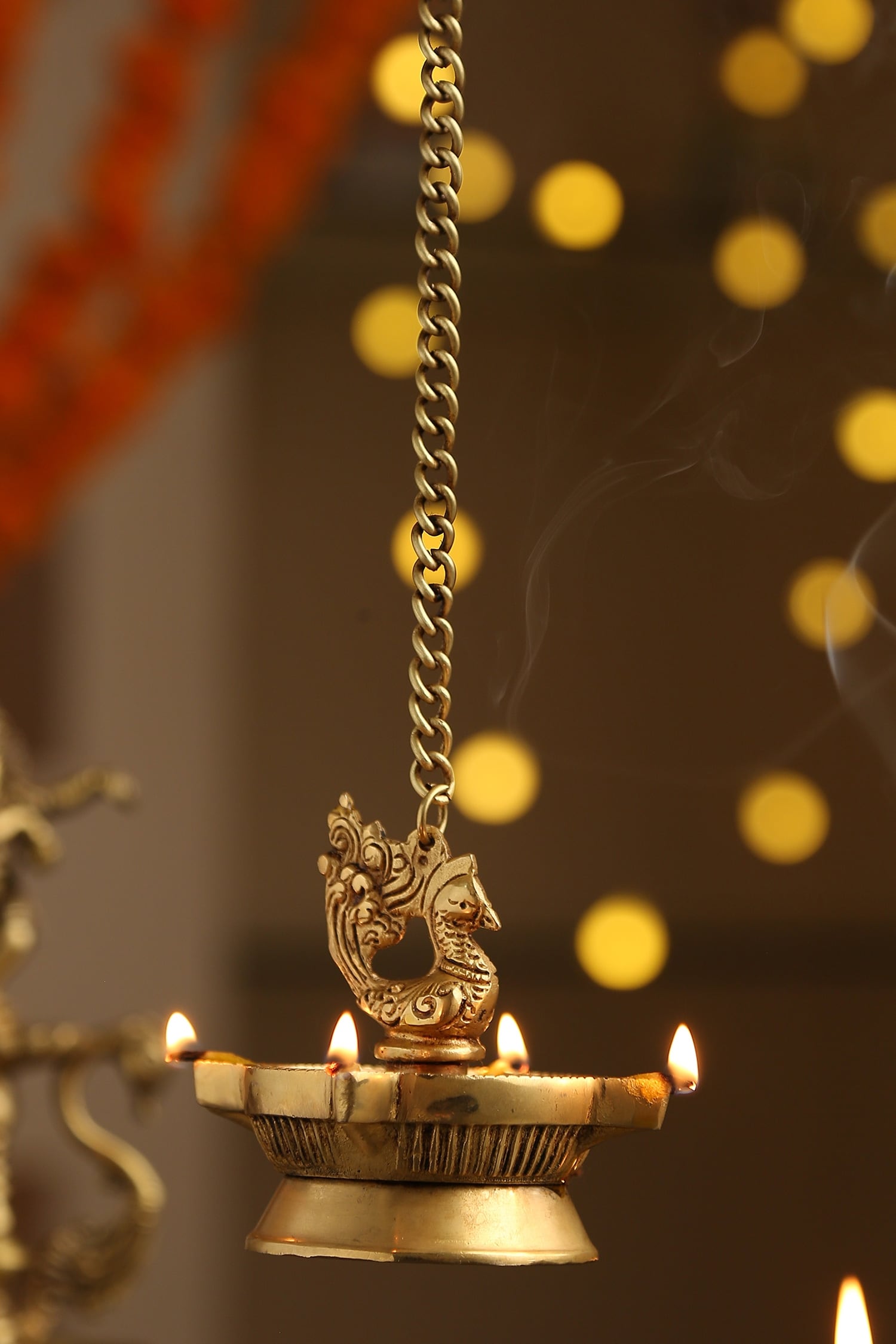 Buy Amoli Concepts Carved Peacock Hanging Diya Online | Aza Fashions