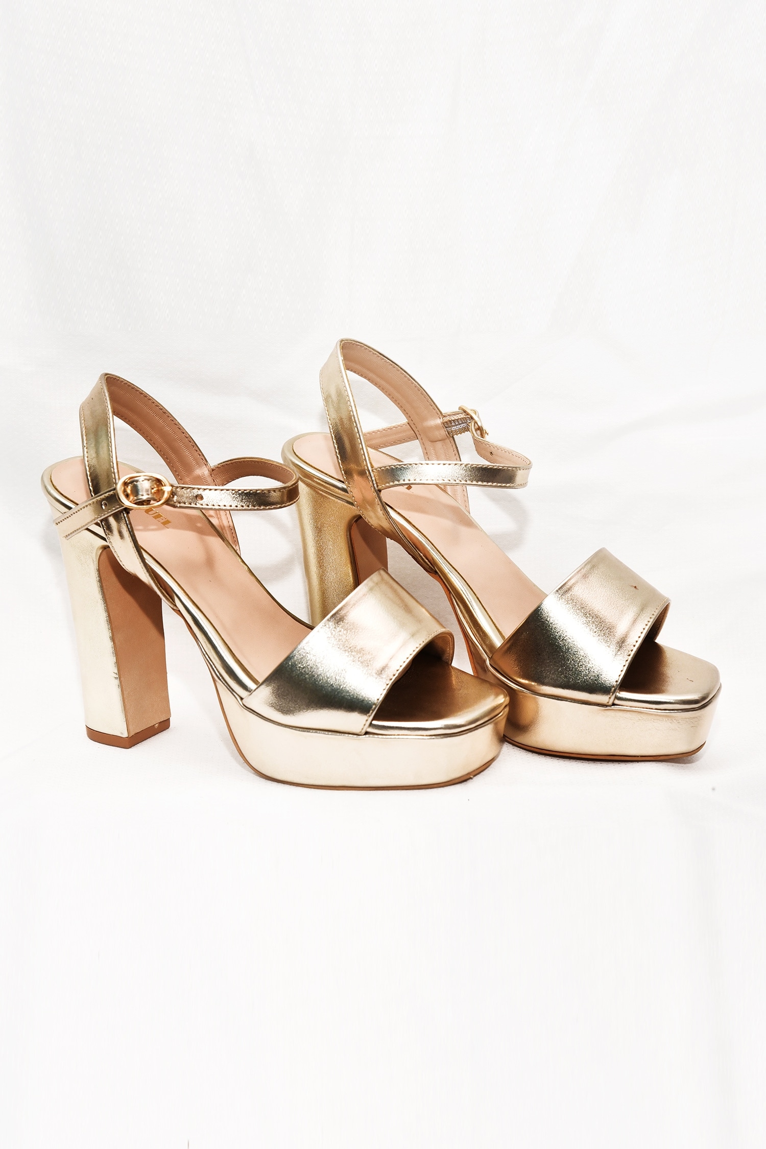 Buy Gold Lucas Metallic Block Heels by Foot Fuel Online at Aza Fashions.