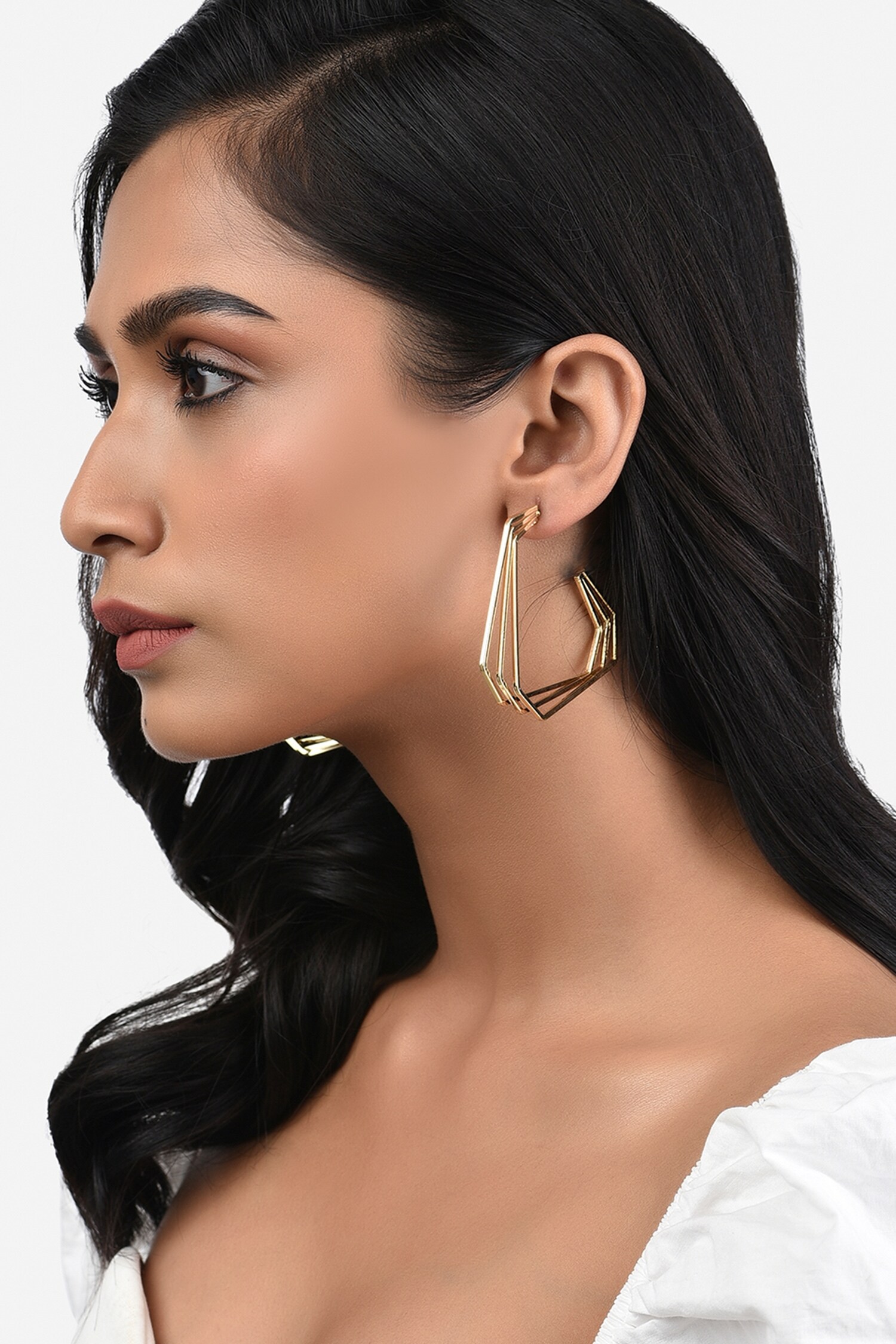 Buy Gold Plated Geometric Shaped Hoops by Ahaanya Online at Aza Fashions.