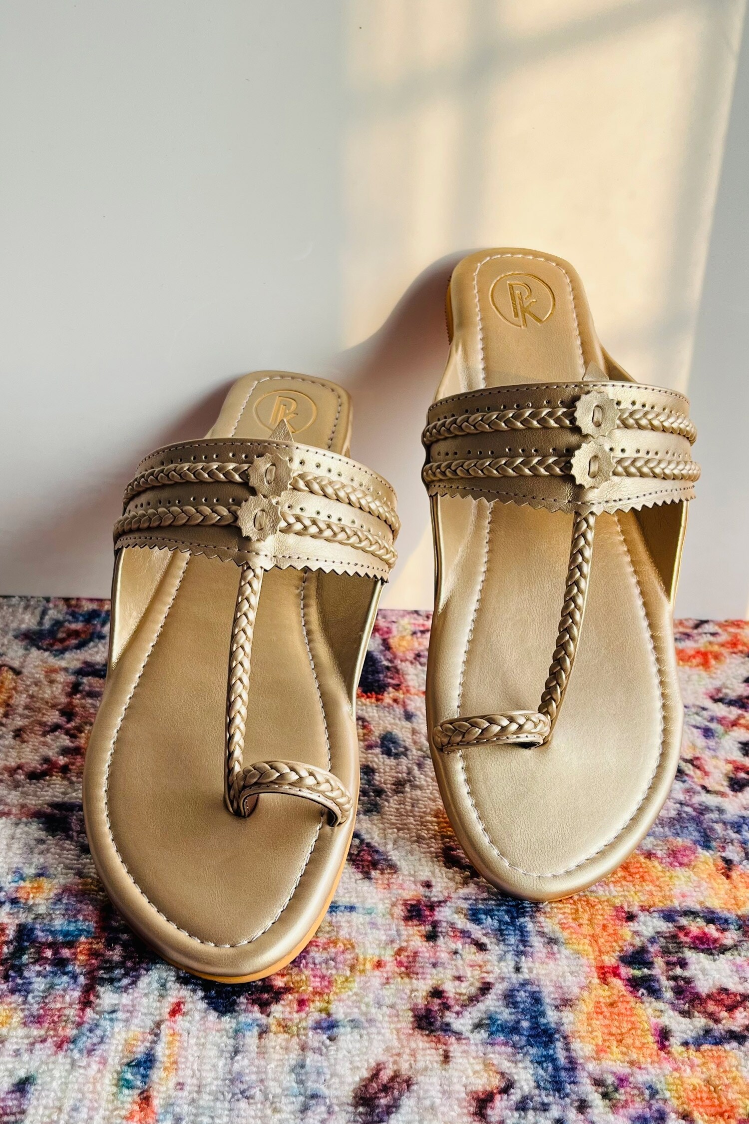 Buy Gold Kolhapuri Flats by PREET KAUR Online at Aza Fashions.