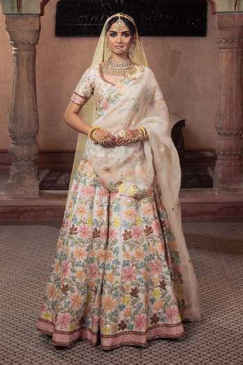Buy Ivory Raw Embroidery Sequin Leaf Neck Floral Bridal Lehenga Set For ...