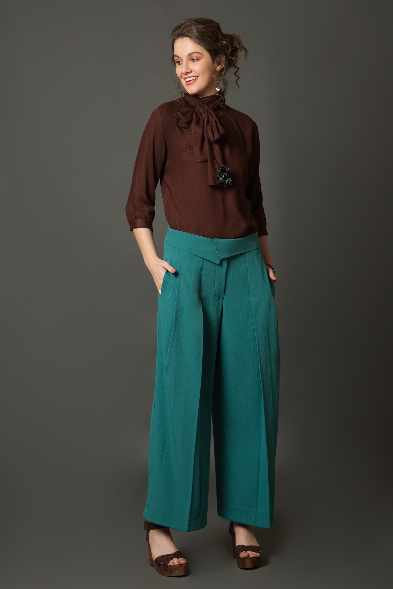 Buy Blue Textured Crepe Fabric Flap Waist Flared Trouser For Women by ...