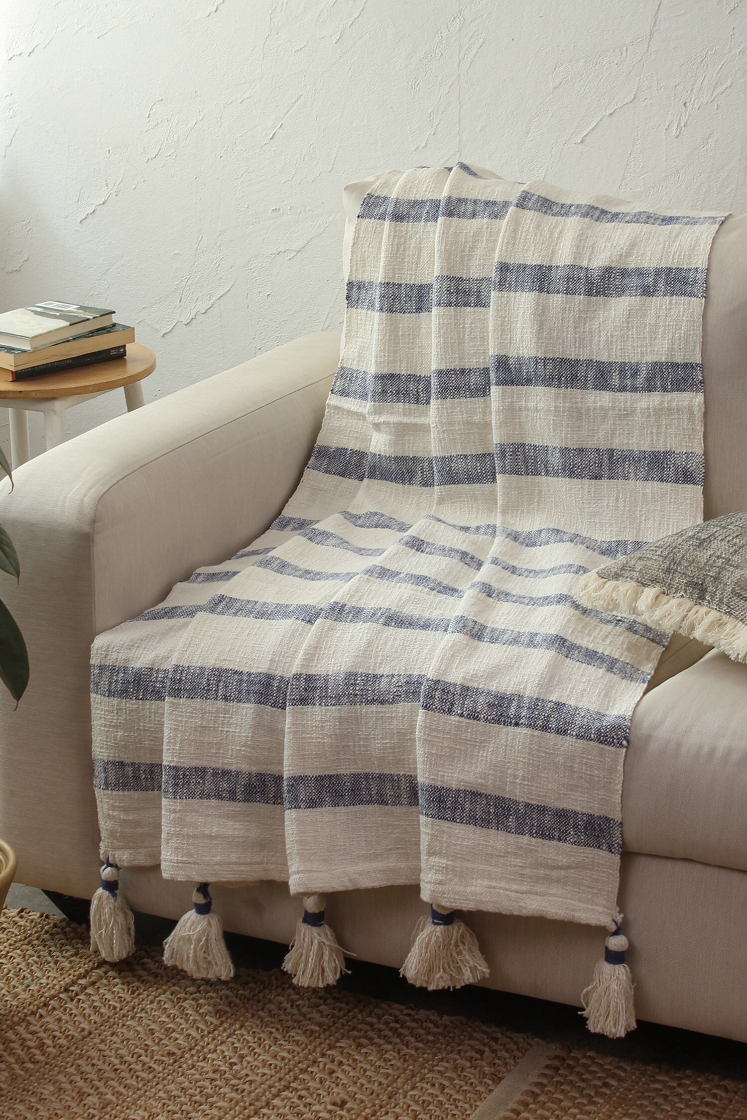 Buy Blue Bunai Woven Texture Throw by House This Online at Aza Fashions.