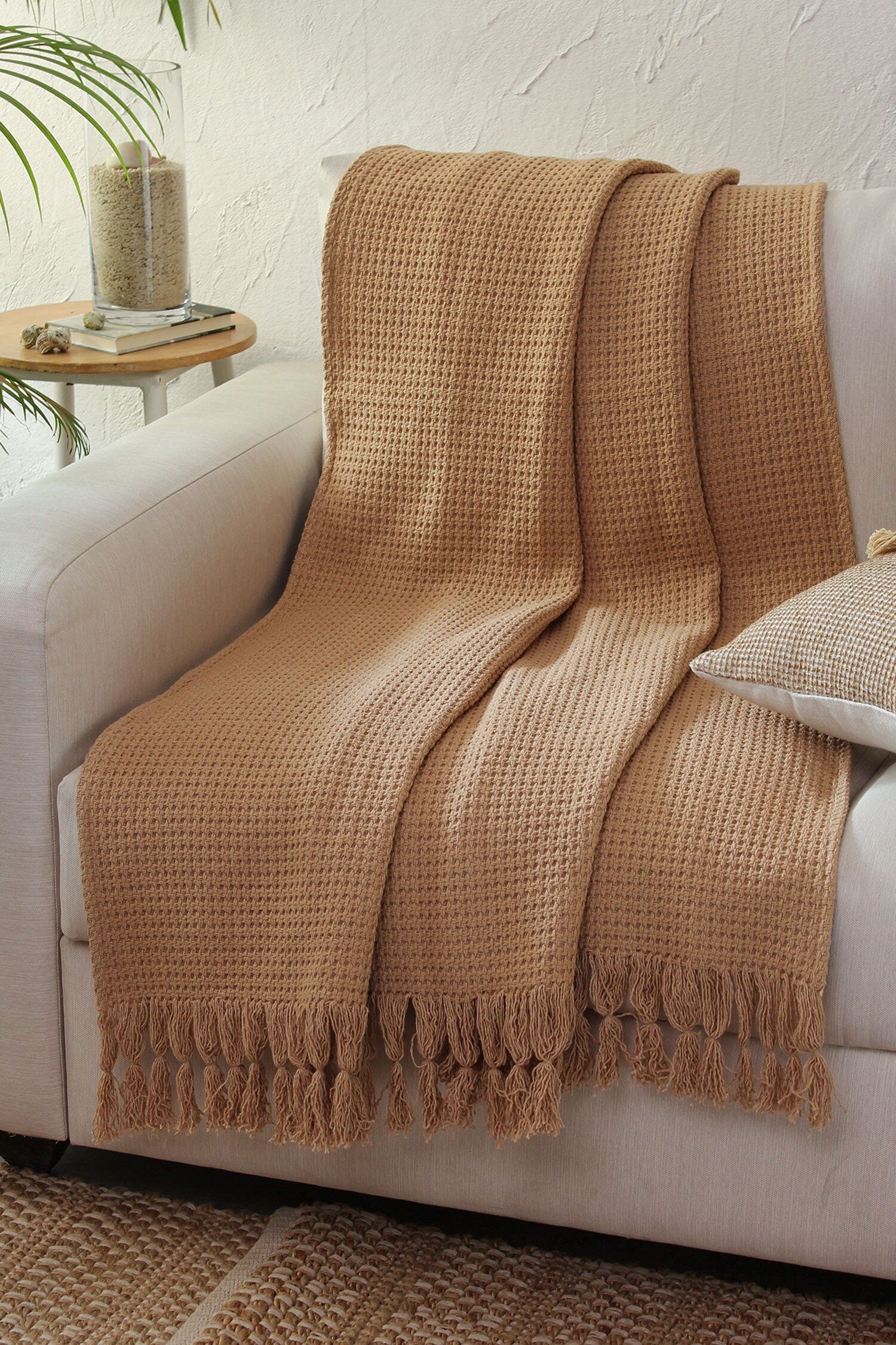 Buy Beige Minicoy Woven Texture Throw by House This Online at Aza Fashions.