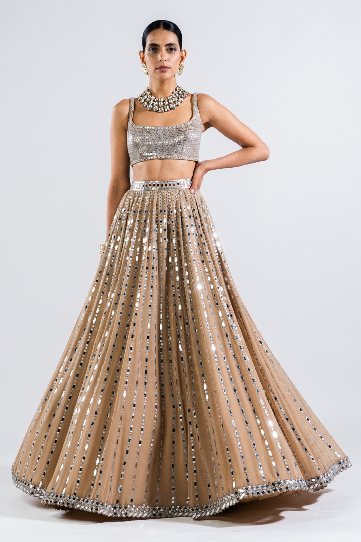Buy Vvani by Vani Vats Beige Linear Pattern Mirror Embellished Lehenga ...