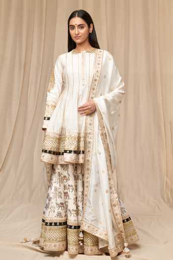Buy Ivory Chanderi Silk Embroidered Aari Work Oasis Foil Print Sharara ...