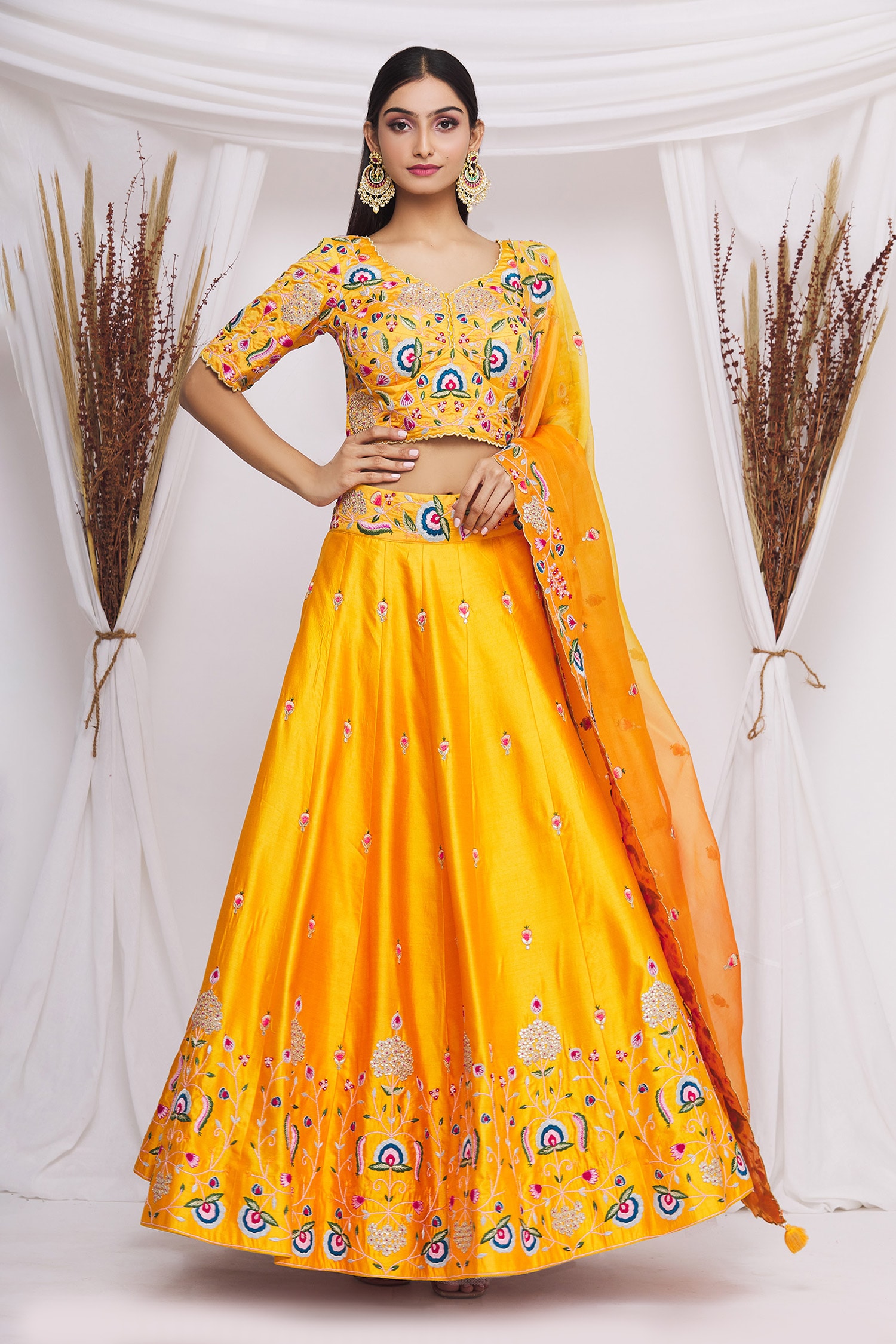 Buy Surbhi Shah Yellow Spun Silk Floral Embroidered Lehenga Set Online
