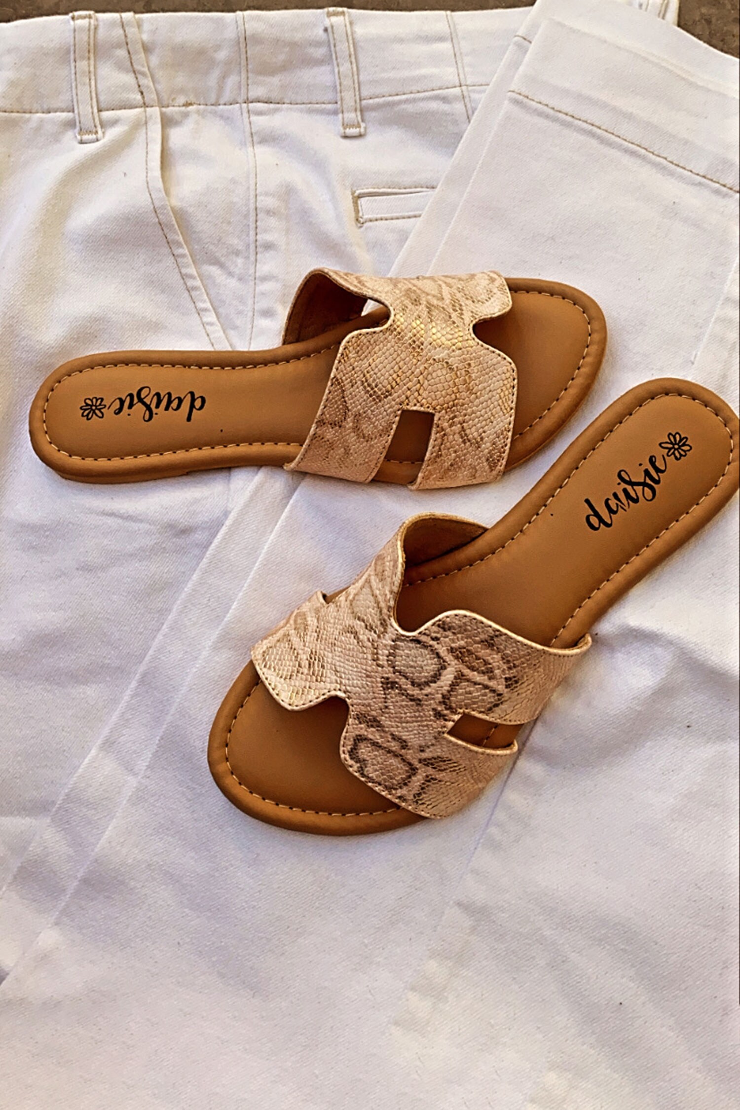 Buy Gold Animal Print Sliders by Daisie Online at Aza Fashions.