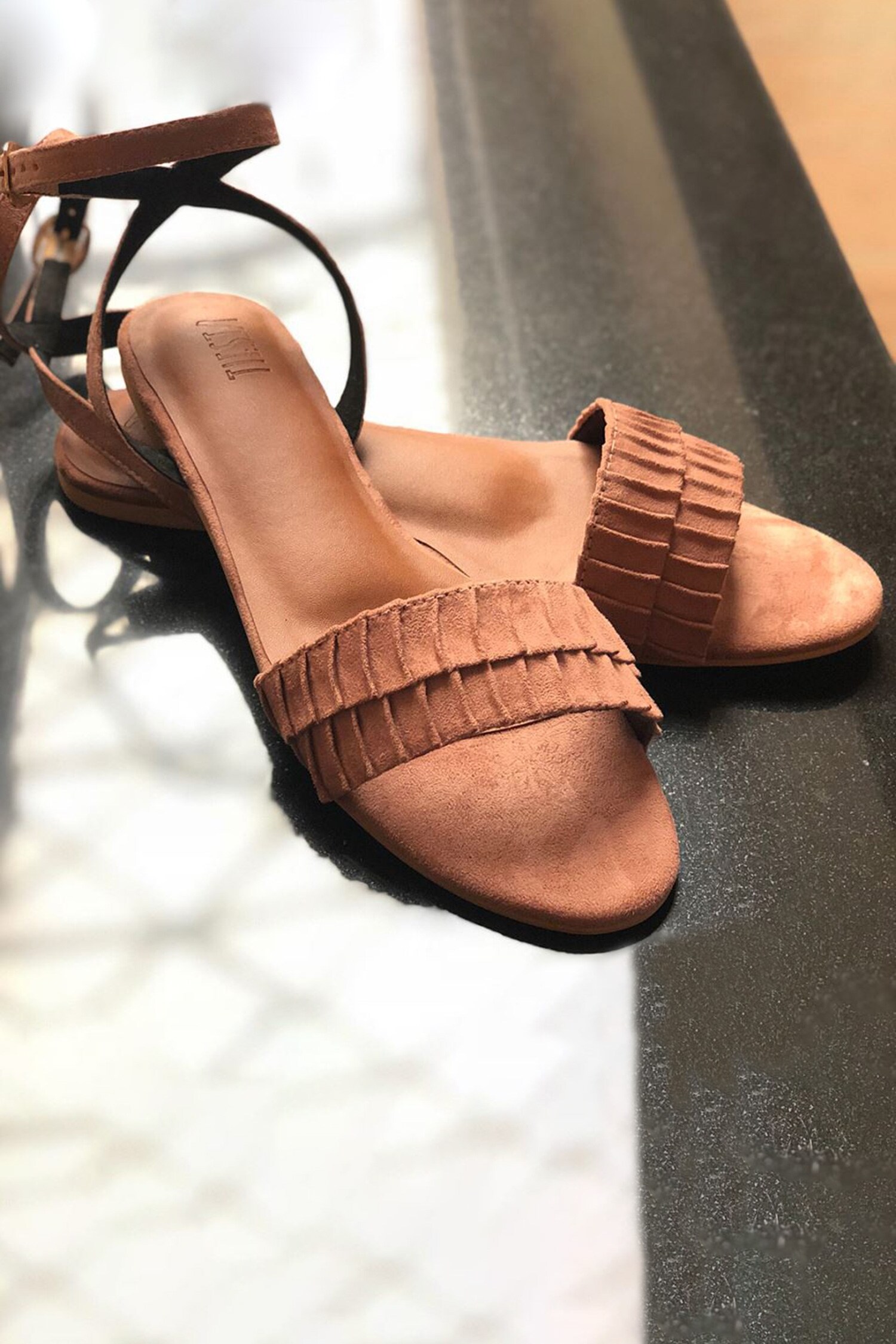 Buy Brown Suede Ruffled Flats by Tiesta Online at Aza Fashions.