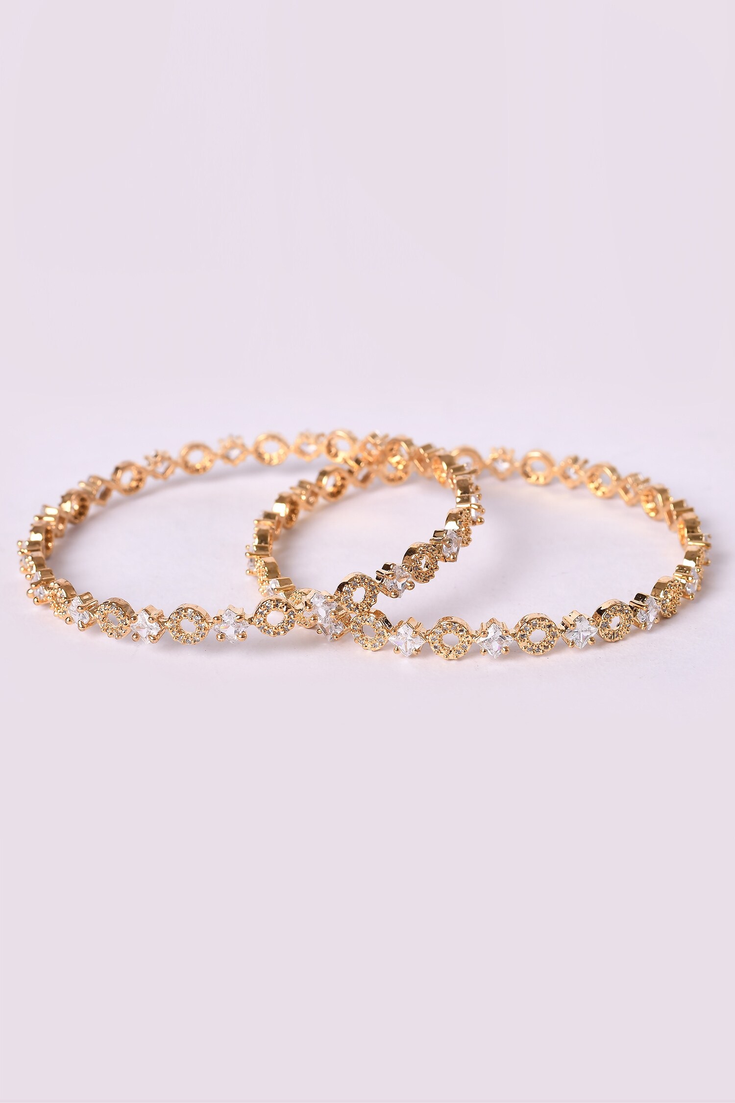 Buy Gold Plated Stones Geometric Cutwork Bangles -Set of 2 by Nazaakat ...