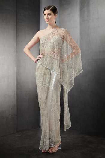 Buy Beige Tulle Embroidered Sequin One Shoulder Saree Gown For Women by ...