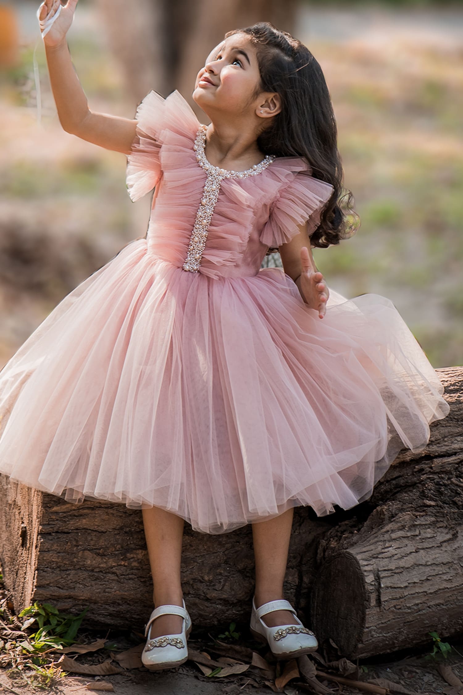 Buy Pink Net Embellished Pearl Layered Ruffle Dress For Girls by ...