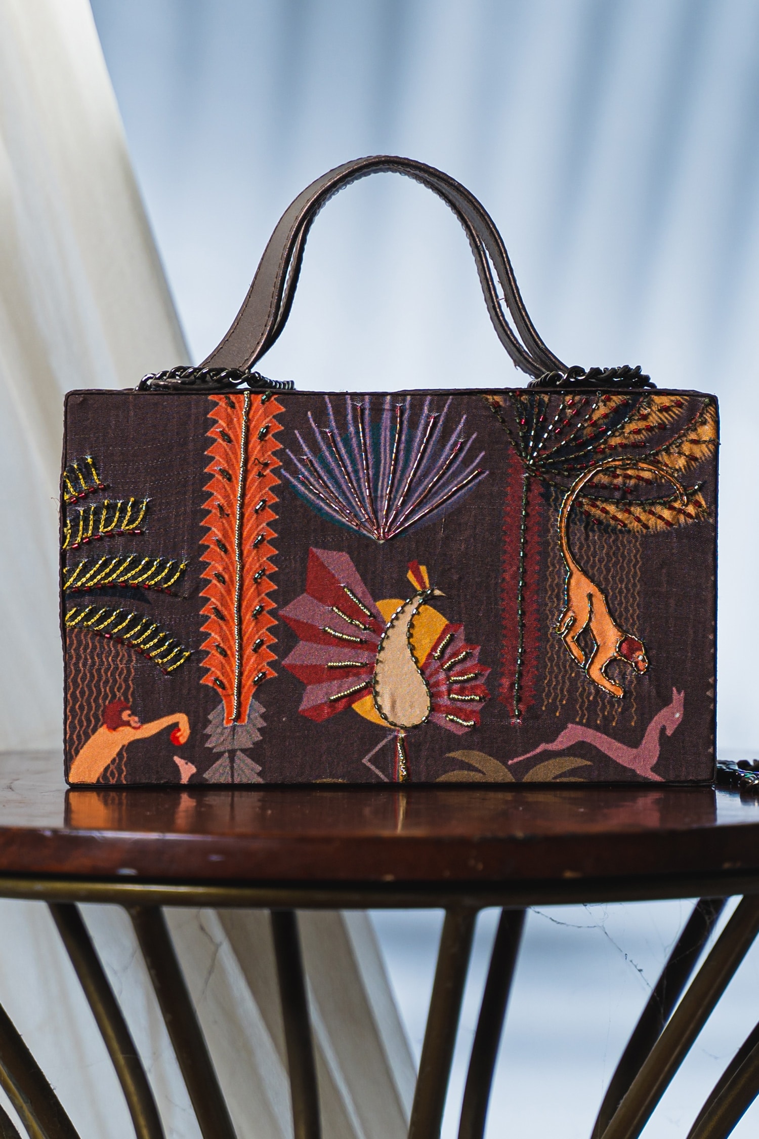 Buy Brown Animal Print Clutch by Soniya G Online at Aza Fashions.