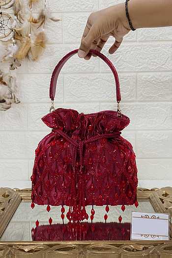 Buy Maroon Pearl Embellished Potli With Strap by Kainiche by Mehak ...