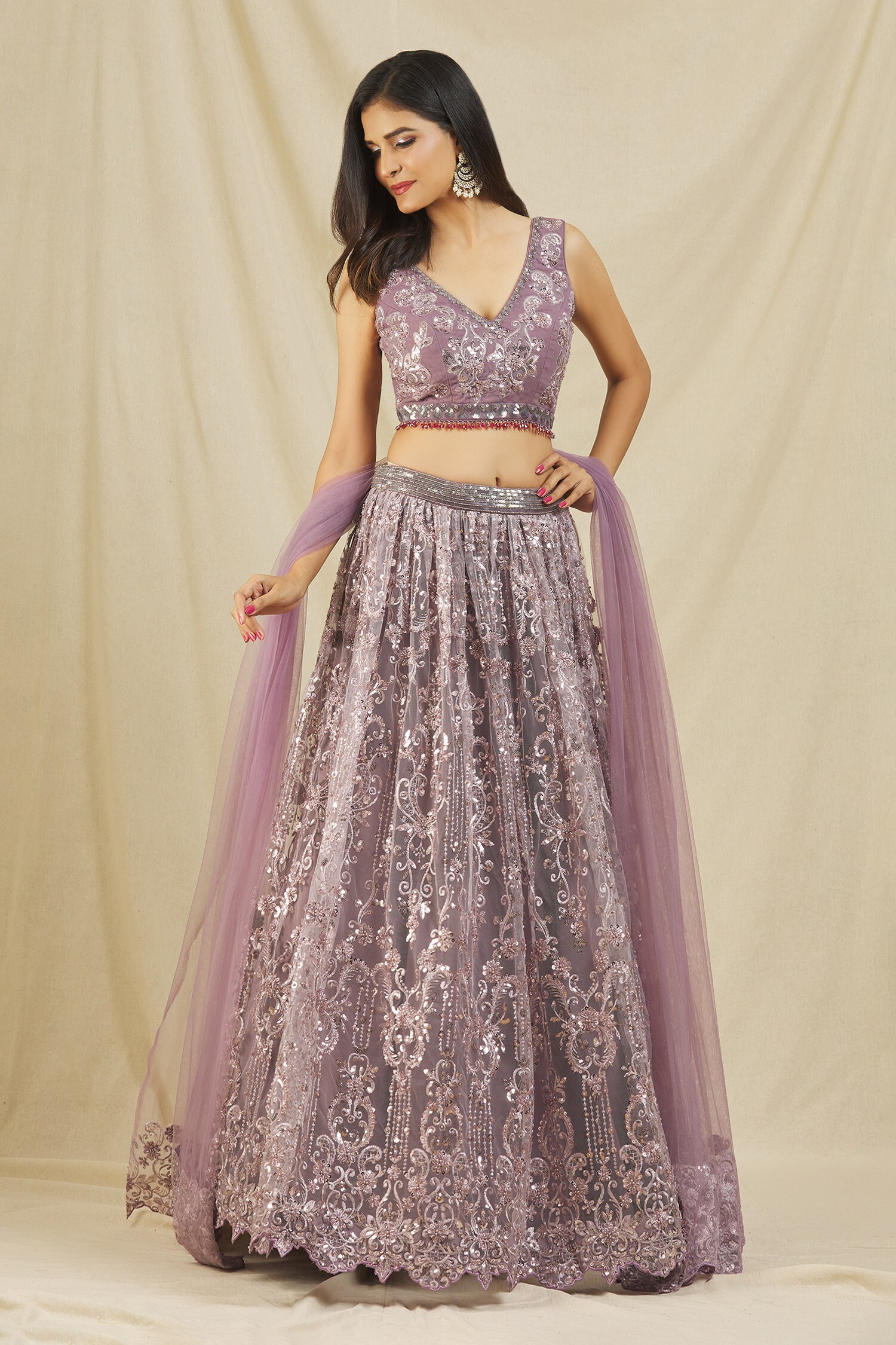Buy Purple Net Embroidered Sequin And Thread Work V Neck Lehenga Set