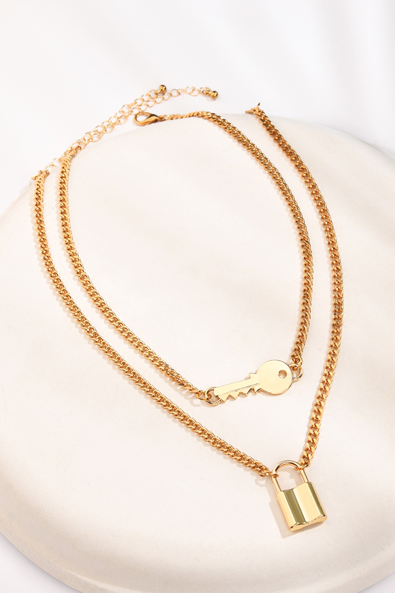 Buy Lock & Key Layered Necklace - 2 Pcs by Ahaanya at Aza Fashions