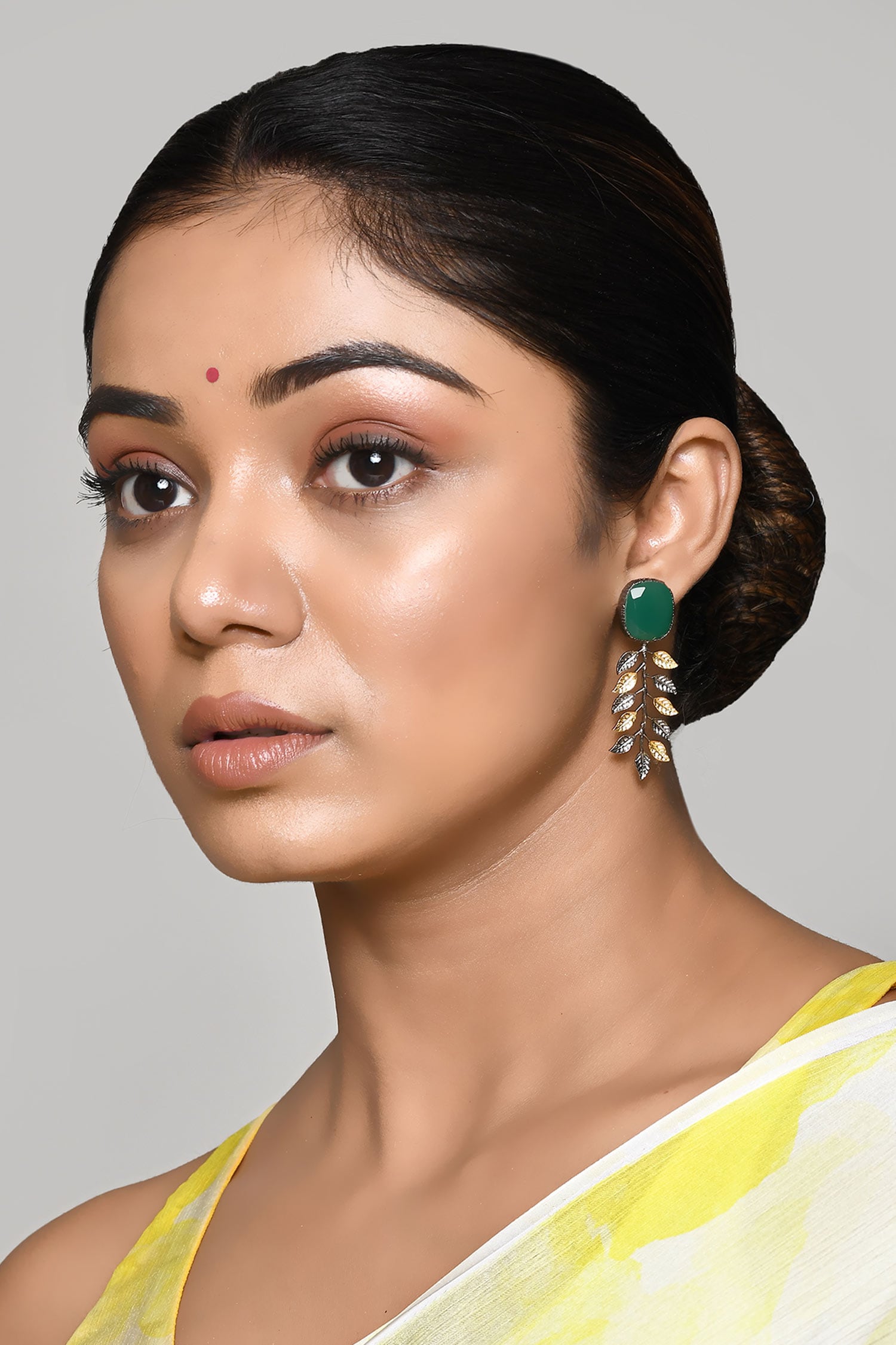 Buy Nazaakat by Samara Singh Leaf Carved And Green Stone Studded Earrings Online | Aza Fashions
