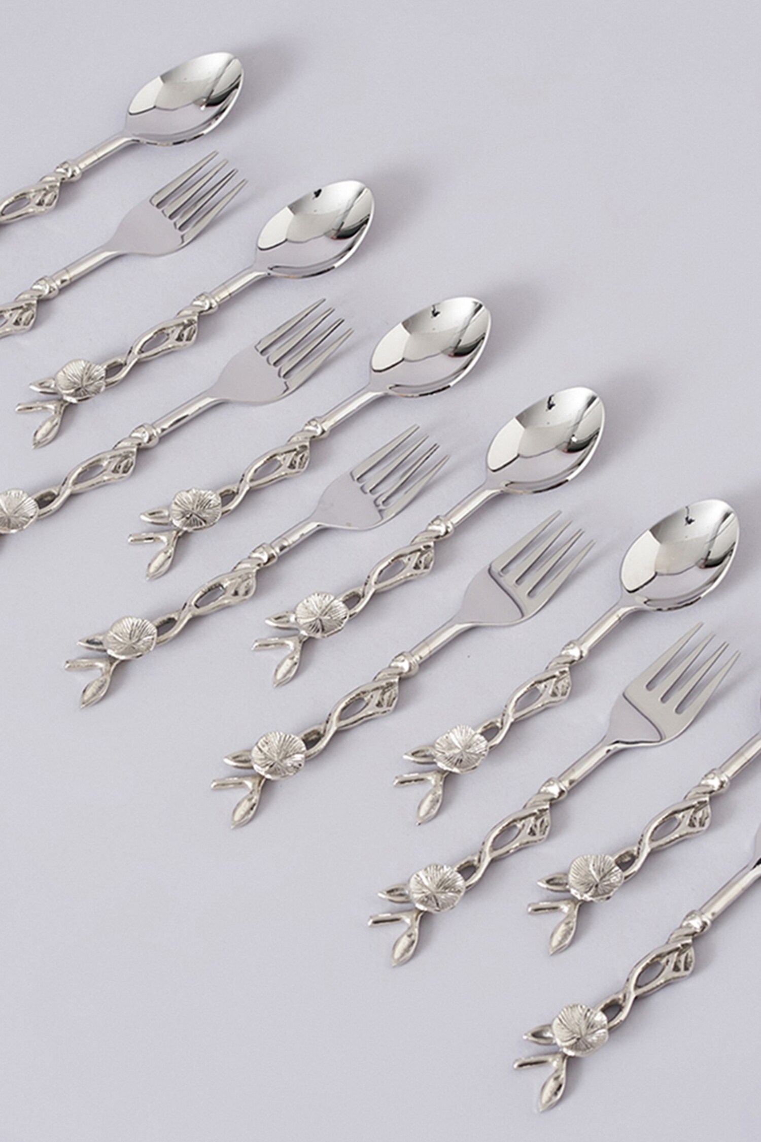 Buy Floral Carved Spoon & Fork 12 Pcs Set by Assemblage at Aza Fashions