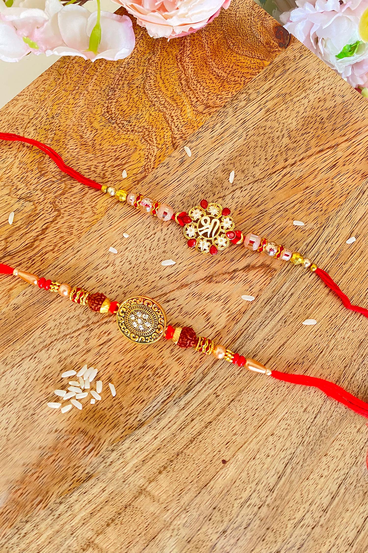Buy Namasya Carved Pattern Embellished Rakhis - Set Of 2 Online | Aza ...