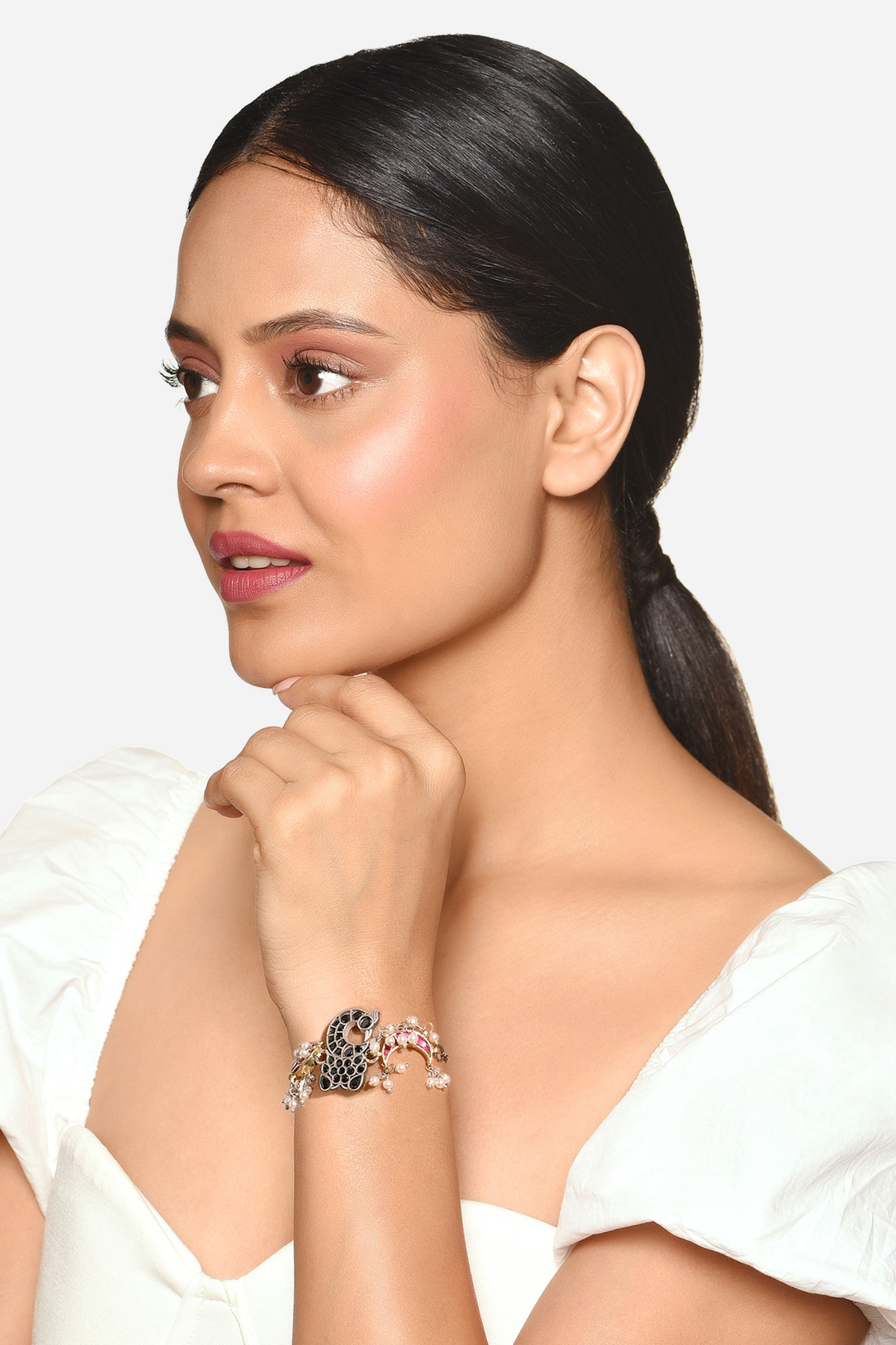 Buy Silver Plated Crystal Stones And Pearl Embellished Peacock Bracelet ...