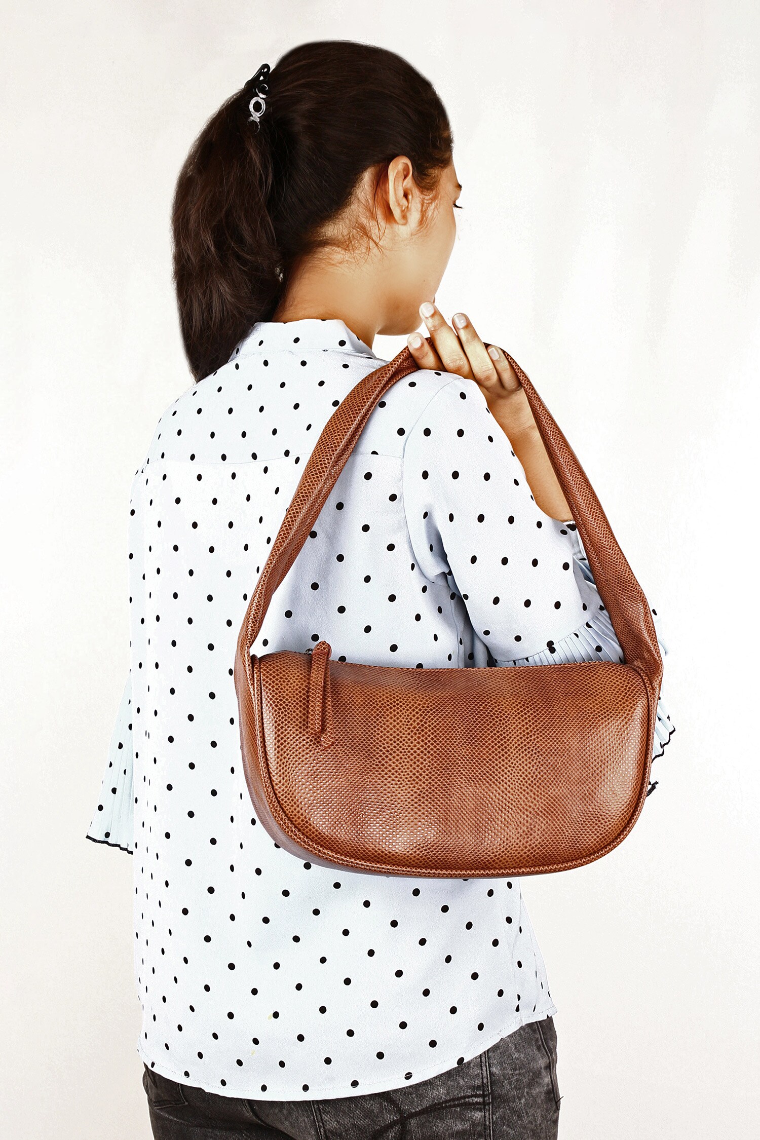 Buy The House of Ganges Cushy Solid Curved Handbag Online | Aza Fashions