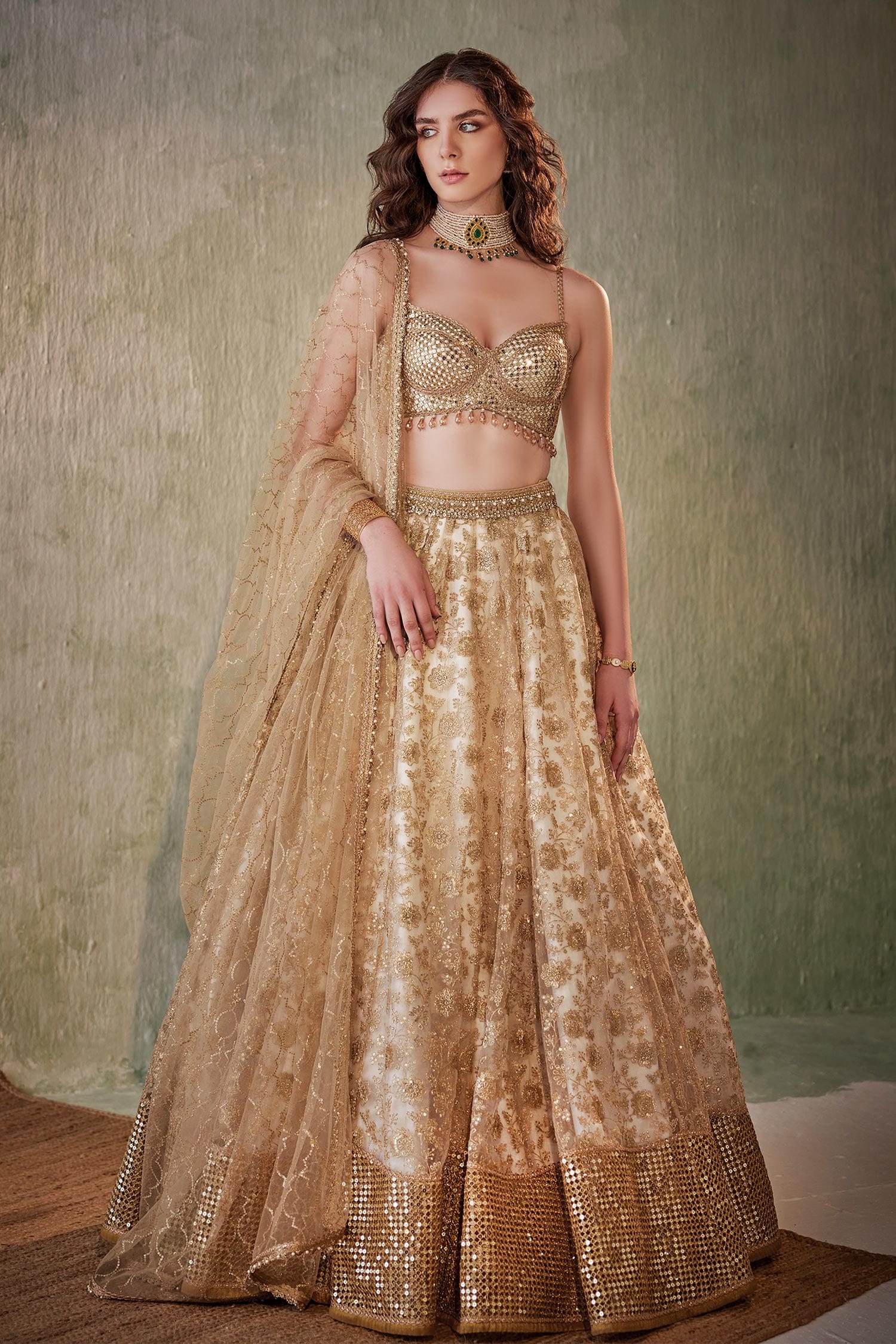 Buy Gold Tulle Embroidered Sequin Sweetheart Blossom Vine Lehenga Set