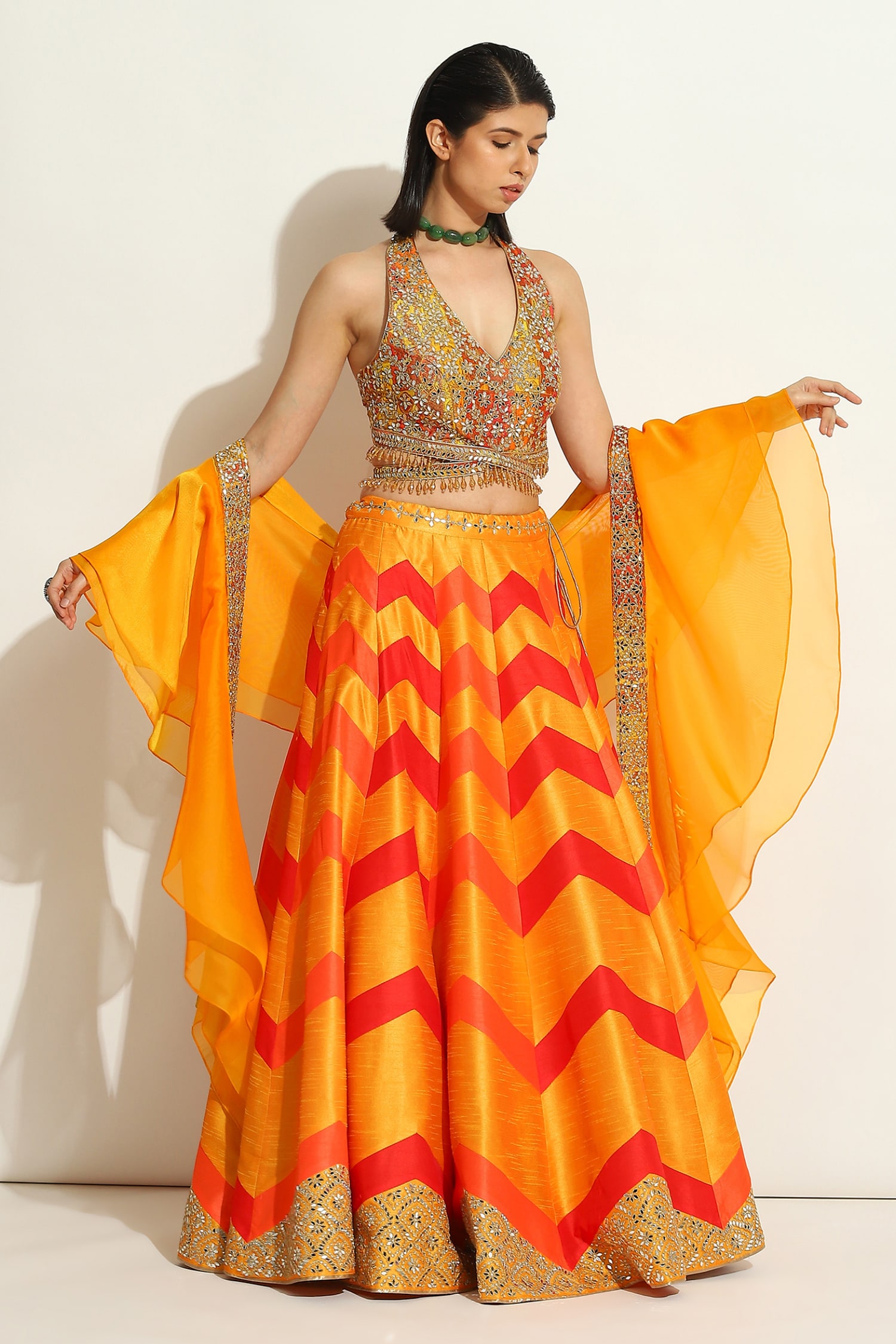 Buy Multi Color Dupion Silk Embroidered Chevron Halter Pattern Lehenga ...