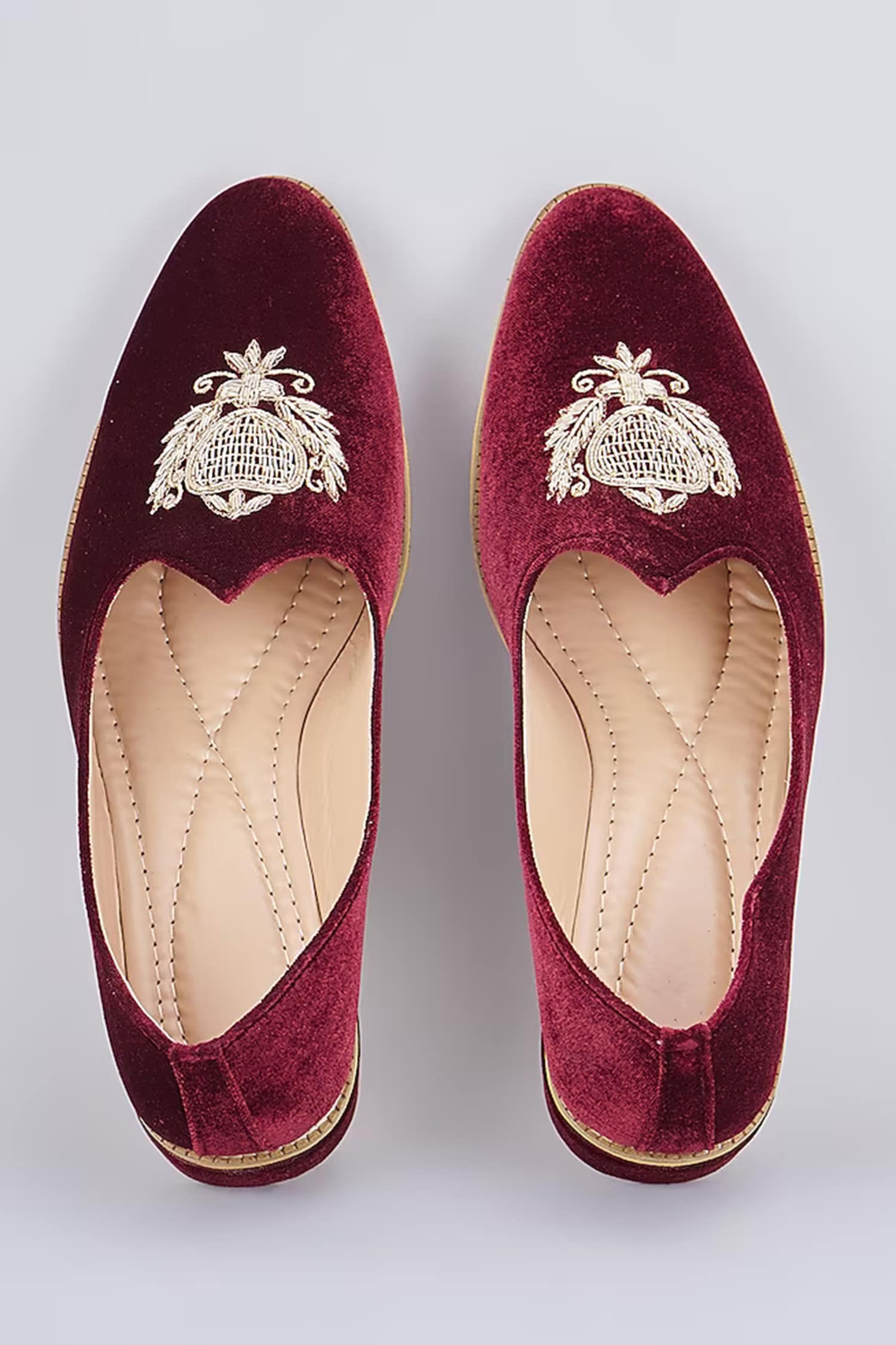 Buy Maroon Zari Royal Crest Embroidered Leather Juttis For Men by RNG ...