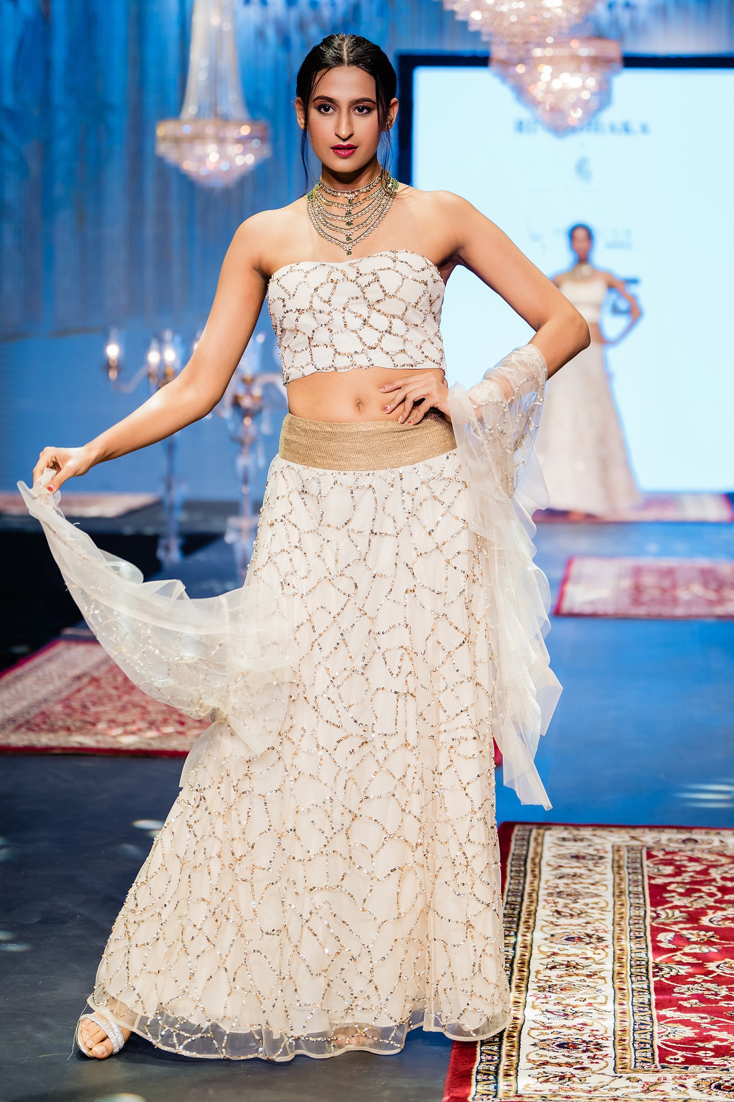 Buy Pink Net Embroidery Sequins Meadow Off Shoulder Blouse Lehenga Set ...