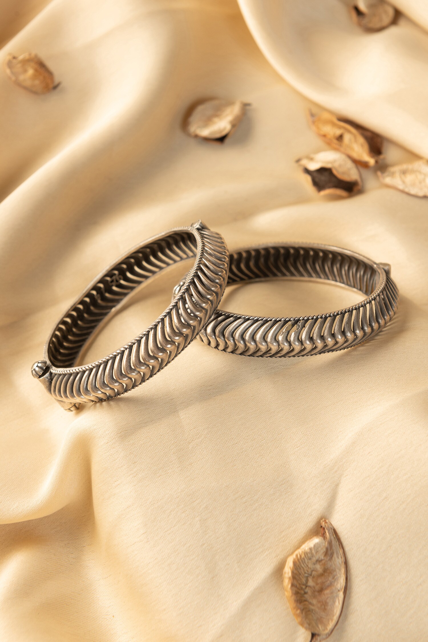 Buy Silver Plated Temple Cutwork Carved Bangle 2 Pcs Set by Mero ...