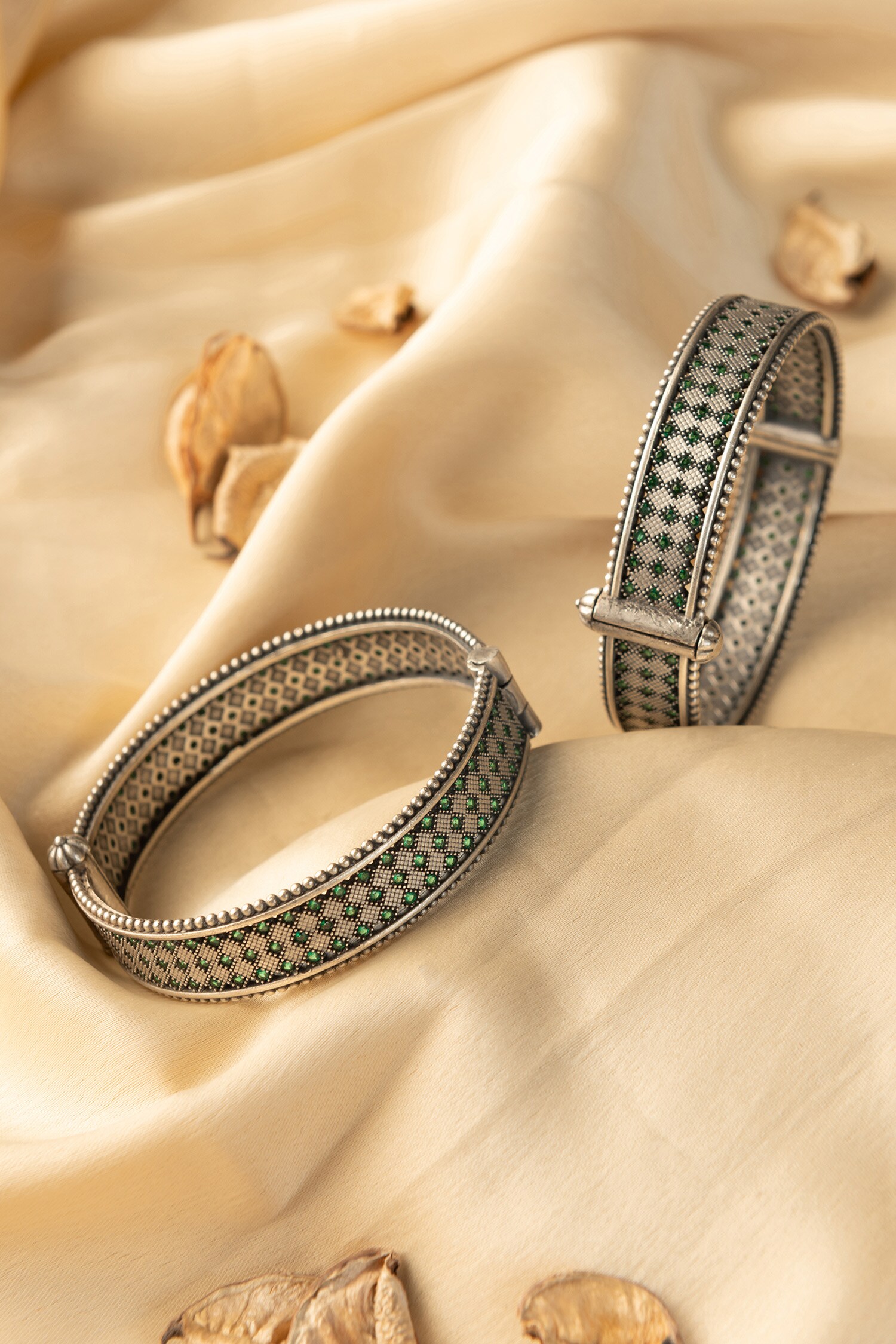 Buy Silver Plated Temple Carved Cutwork Bangle 2 Pcs Set by Mero Jewellery Online at Aza Fashions.