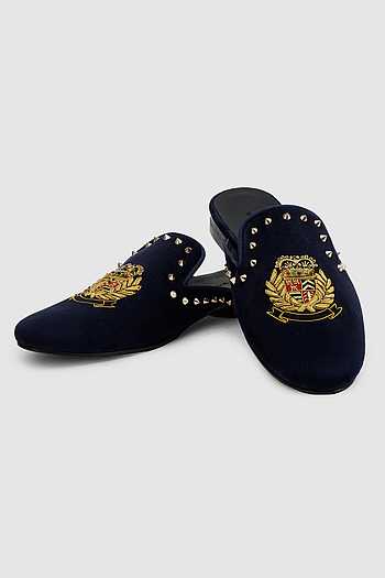 Buy Blue Hand Embroidered Royal Emblem Studded Embellished Mules For ...